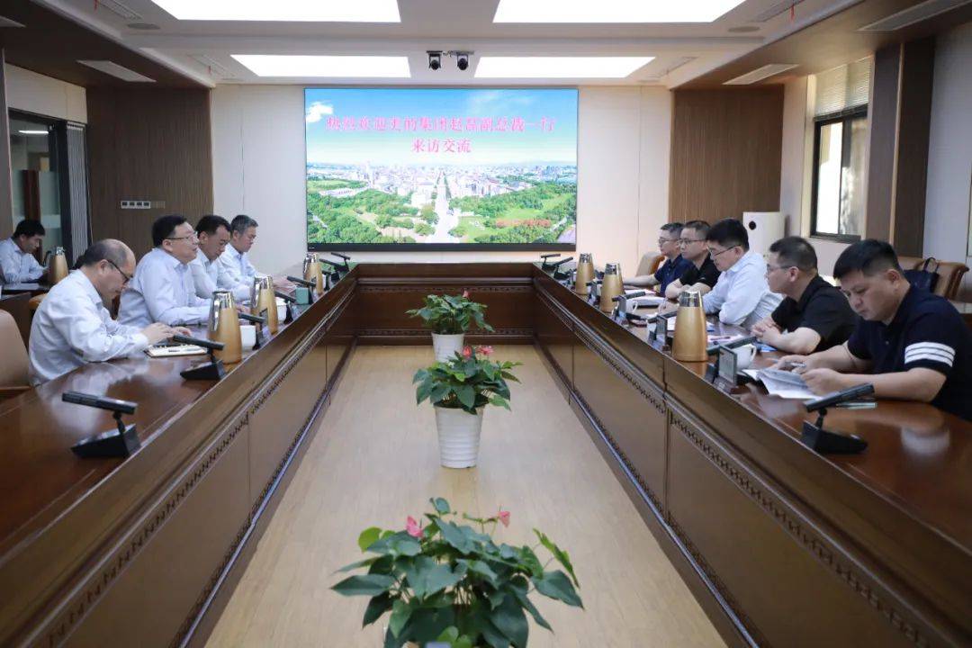 李军会见美的集团副总裁、美的家用空调事业部总裁赵磊_加强合作_发展_双方